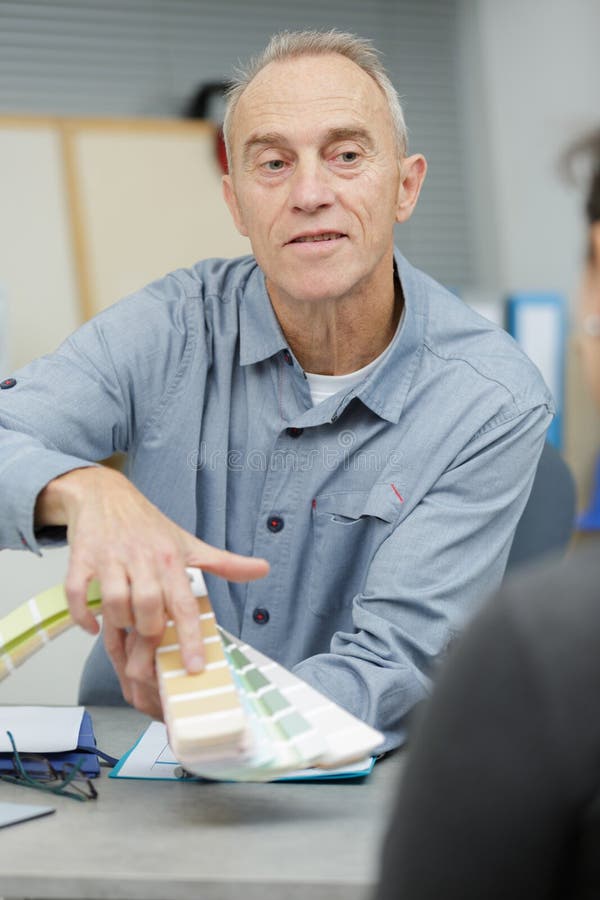 Mature Man Holding Color Charts Stock Photos - Free & Royalty-Free Stock Photos from Dreamstime