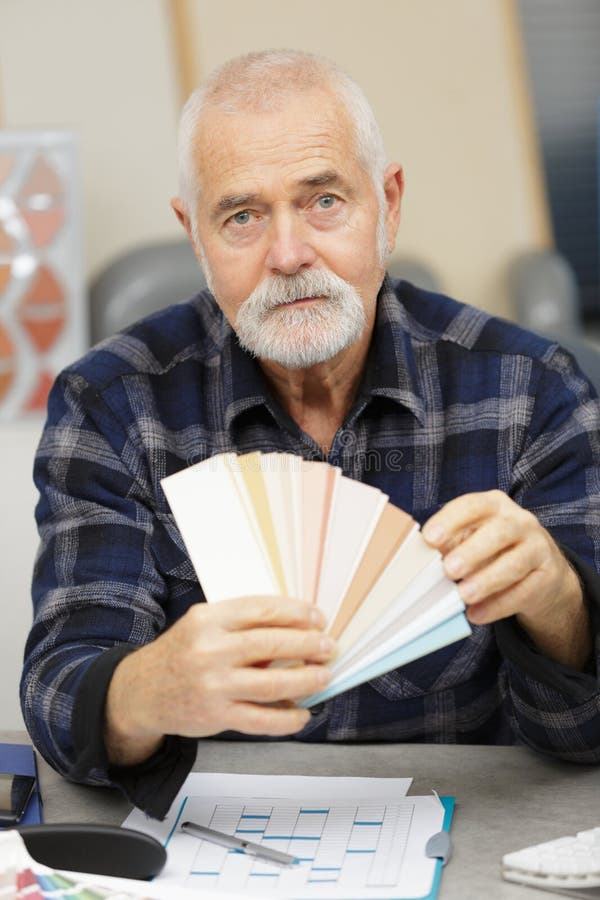 Mature Man Holding Color Charts Stock Photo - Image of pensioner ...