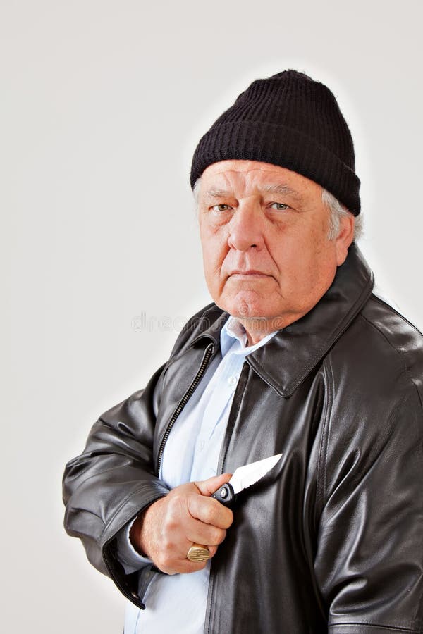 Mature man with knife stock image. Image of adult, confidence - 21542963