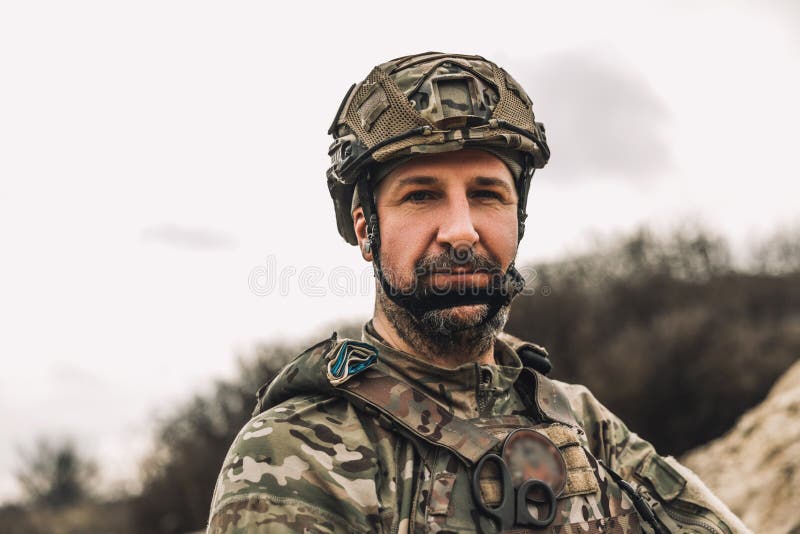 Mature Man in Military Uniform and Protective Hemlet Stock Photo ...
