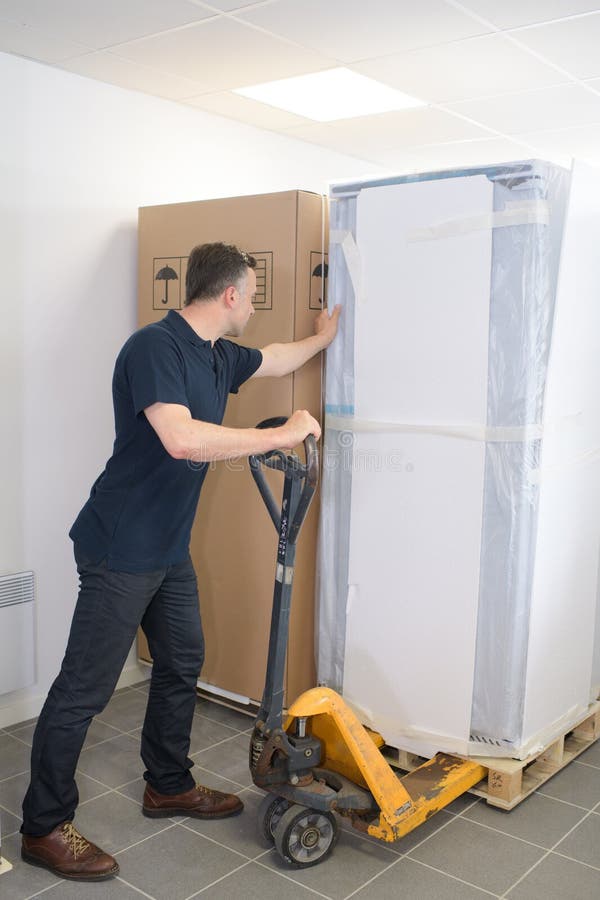 Mature Man Moving Huge Cartons with Trolley Stock Image - Image of ...