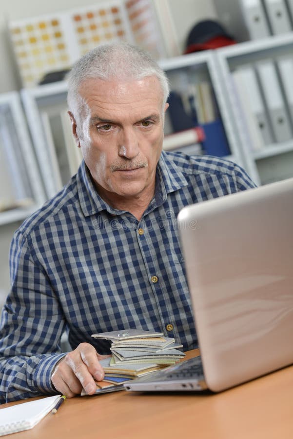 Mature Man Ordering on-line Stock Photo - Image of white, modernity ...