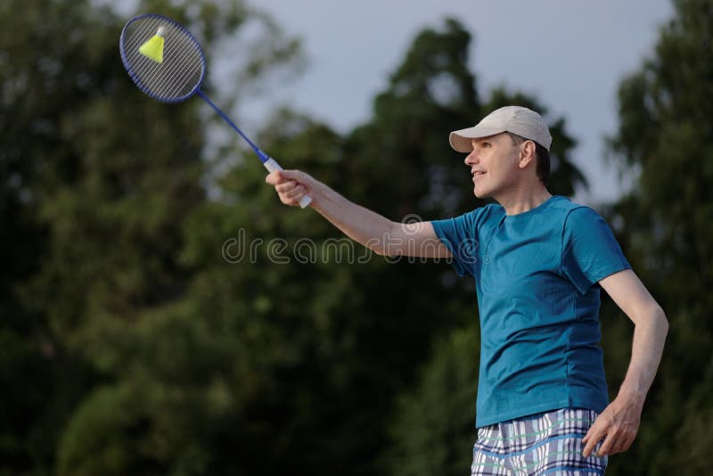 Man playing badminton stock photo. Image of people, caucasian - 99644828