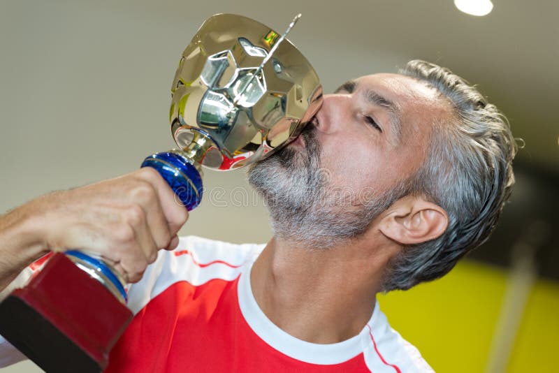 Mature man proud trophy stock photo. Image of handsome - 100878712