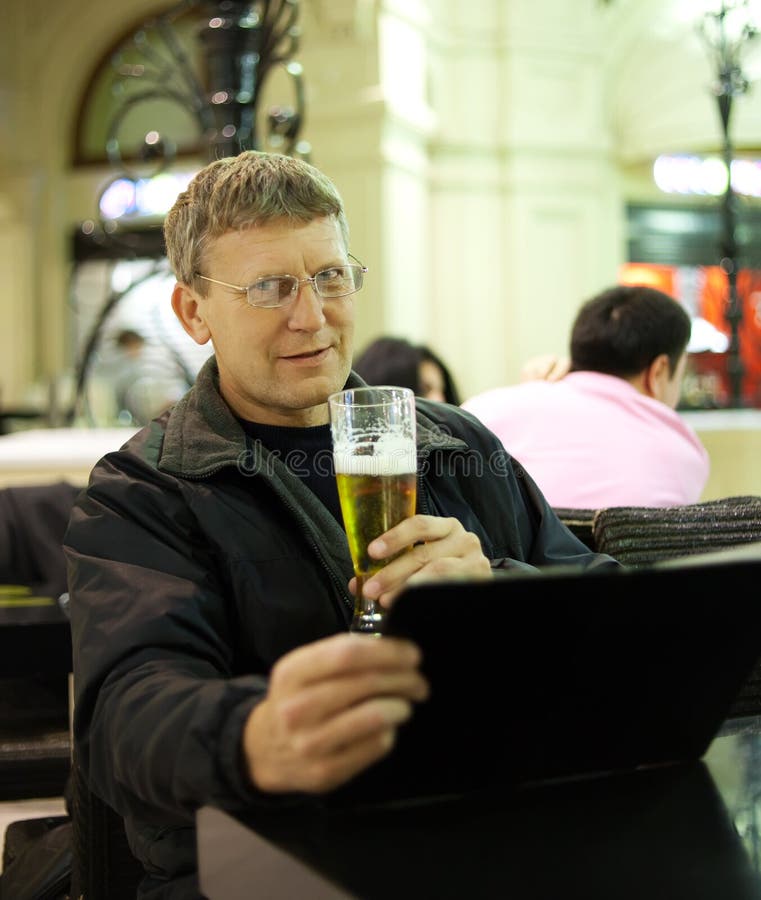 Mature Man Reading Menu Card Stock Photo - Image of cafe, room: 21577486