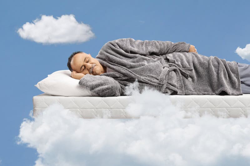 Mature Man Sleeping on a Matress and Floating in the Sky Stock ...