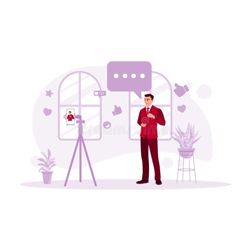 A Mature Man Smiling while Presenting Something Using a Mobile Phone ...