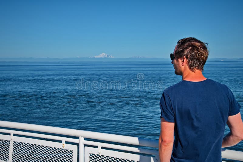 Man Standing on the Deck of the Ferry Stock Image - Image of casual ...