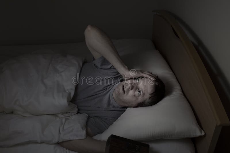Mature Man Staring at Ceiling during Night Time while in Bed Stock ...