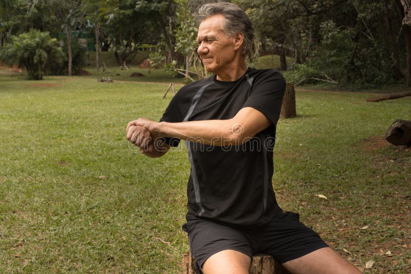 Mature Man Stretching before Working Out Stock Image - Image of stretch ...