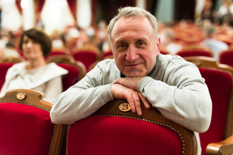 Mature Man in Theater Watching a Performance Stock Photo - Image of ...