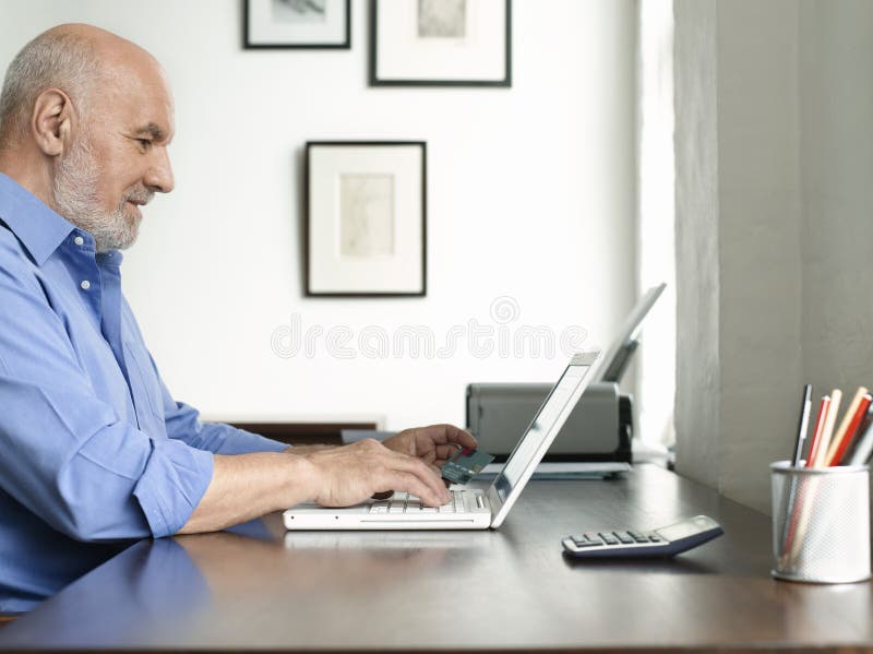 Man Using Printer at Study Table in House Stock Photo - Image of people ...