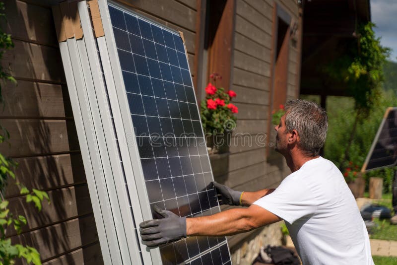 Man Carry Solar Panel Stock Photos - Free & Royalty-Free Stock Photos ...