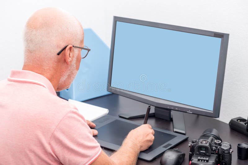 Mature Man Working with Graphics Tablet in His Office Stock Image ...