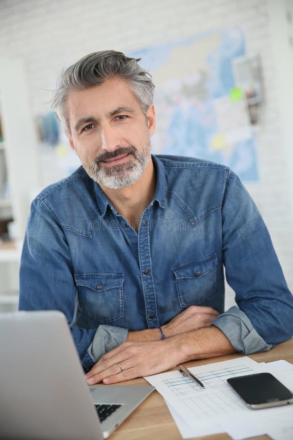 Mature Man Working on Laptop at School Stock Image - Image of class ...