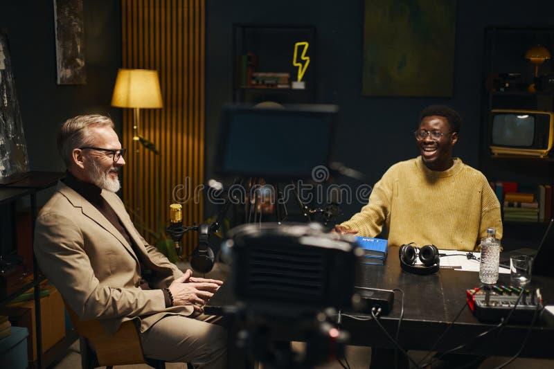 Man Sitting at Interview in Studio Stock Image - Image of together ...