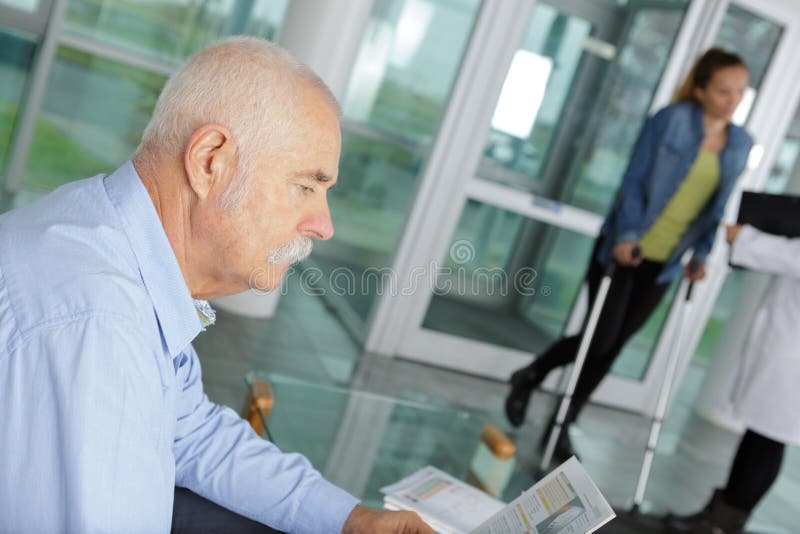 Mature Man Waiting at Hospital Stock Photo - Image of lobby ...