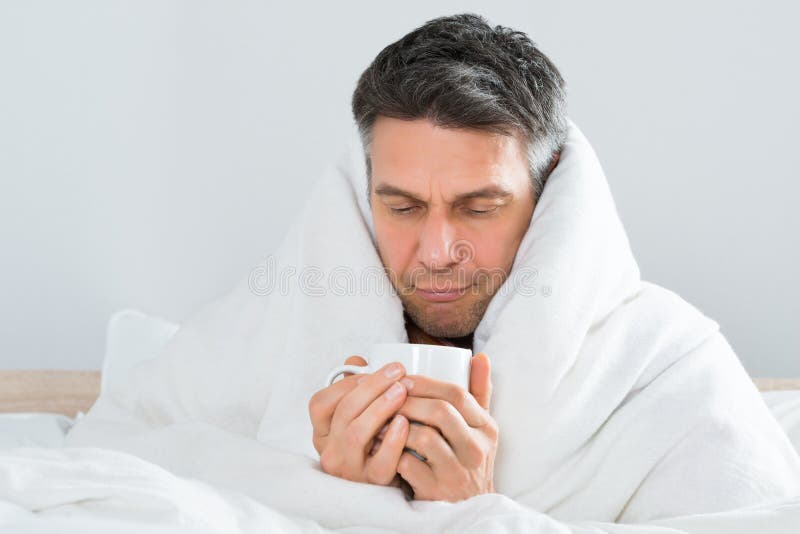 Mature Sick Man Holding Cup of Coffee Stock Photo - Image of fever ...
