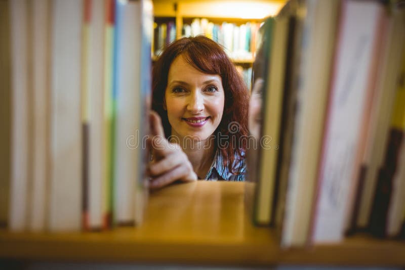 Mature Student Picking Out Book in Library Stock Photo - Image of ...