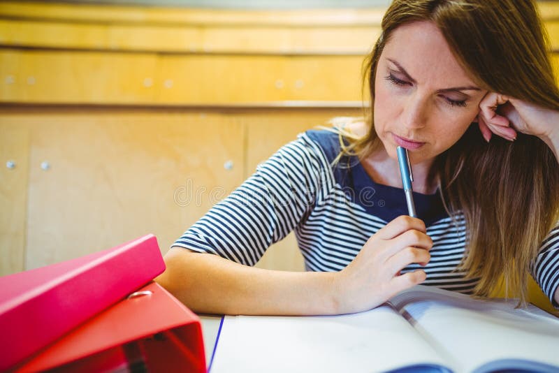 Mature Student Taking Notes in Lecture Hall Stock Photo - Image of ...