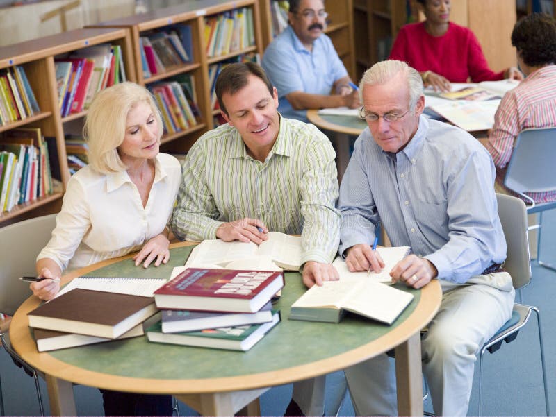 Mature Students Learning Computer Skills Stock Photo - Image of holding ...