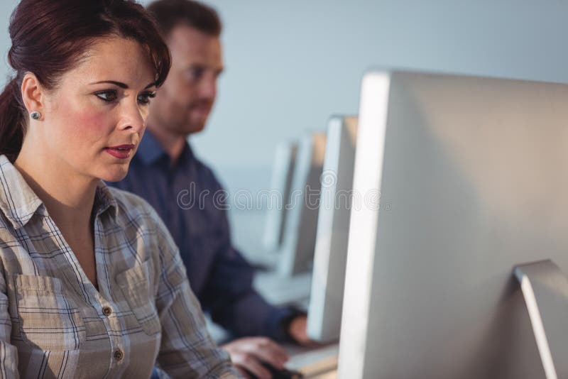 Mature Students Using Computer Stock Photo - Image of indoors ...