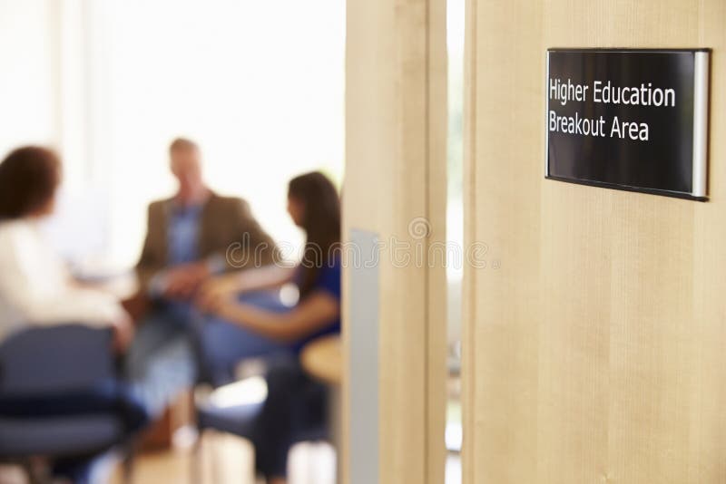 Mature Students Working in College Breakout Area Stock Image - Image of ...