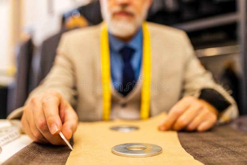 Mature Tailor Working with Sewing Pattern in Atelier Stock Image ...