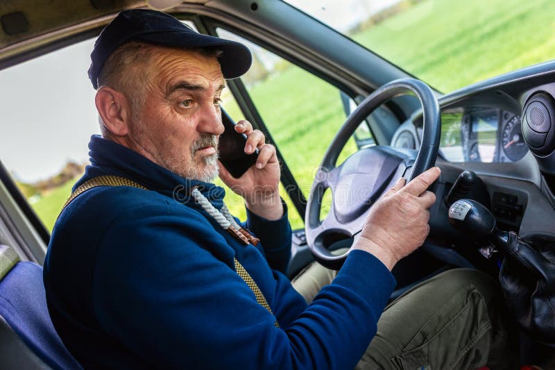 Truck Driver Using Mobile Phone while Driving Transport Vehicle Stock ... Truck Driver Using Mobile Phone while Driving Transport Vehicle Stock ...