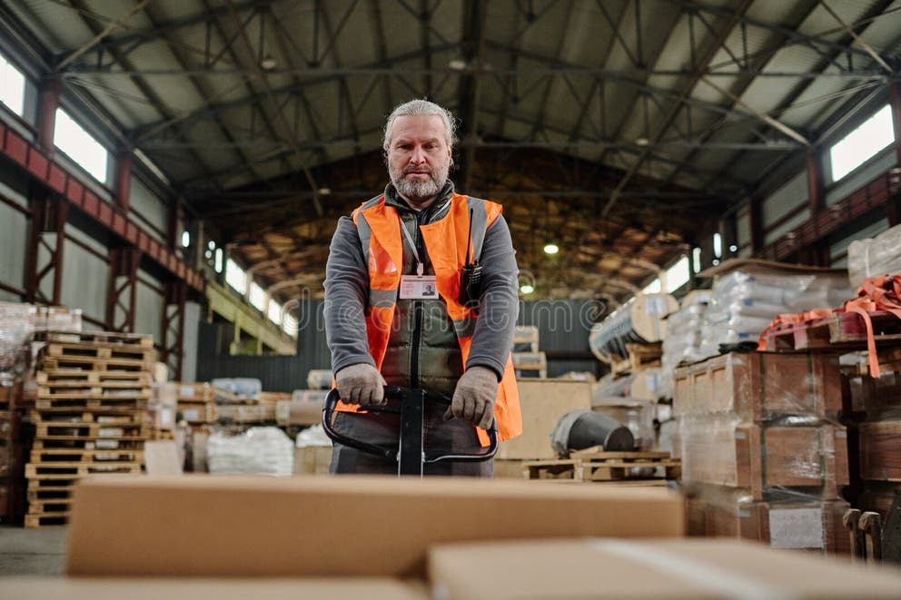 Worker Carrying Containers on Loader Stock Photo - Image of loader ...
