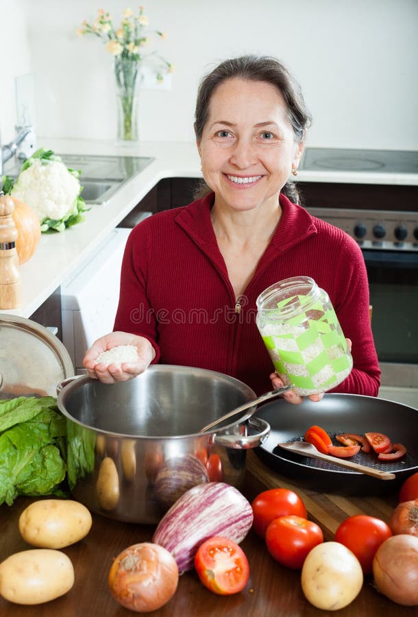 Mature Woman Cooking Soup Rice Stock Photos - Free & Royalty-Free Stock ...