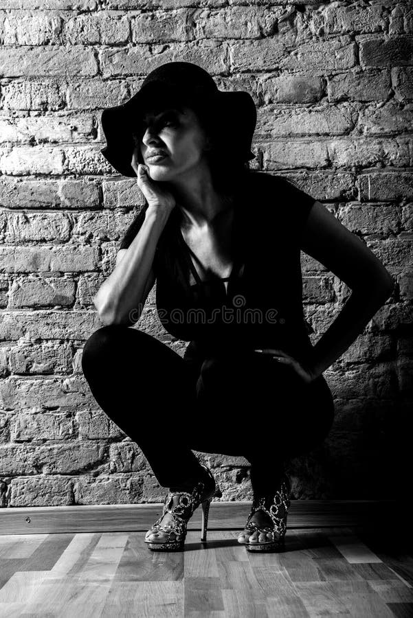 Woman Crouching Stock Photos - Download 3,484 Royalty Free Photos