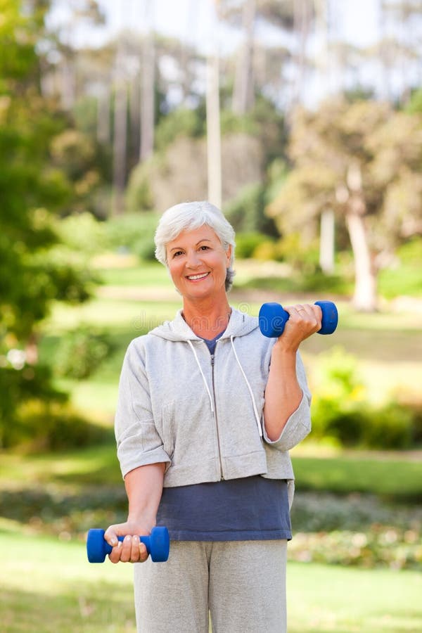 Mature Woman Doing Her Exercises Stock Image - Image of active, senior ...