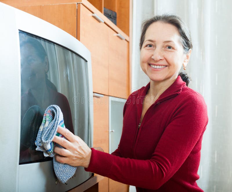 Mature Woman Dusting Tv Stock Photos - Free & Royalty-Free Stock Photos ...