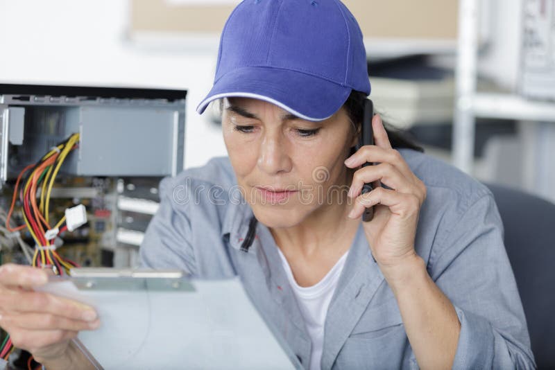 Mature Woman Fixing Computer Stock Image - Image of installation ...