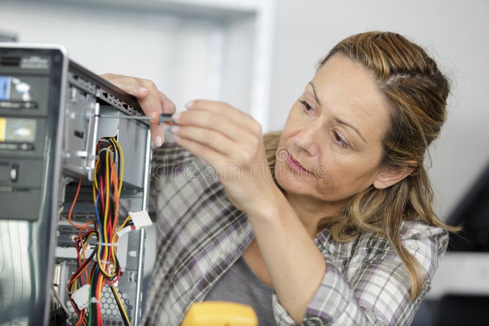 Mature Woman Fixing Computer Stock Image - Image of cables, blond ...
