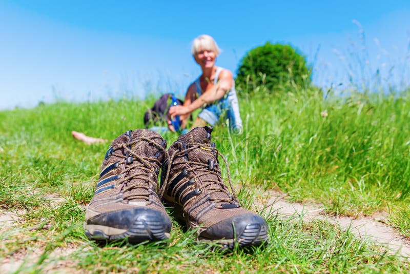 Mature Woman at a Hiking Rest Stock Image - Image of attractive, grass ...