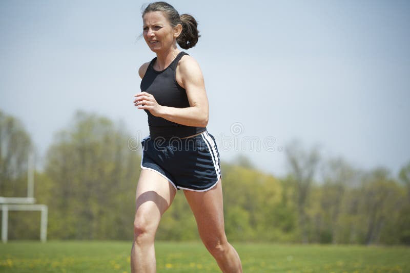 Woman running stock photo. Image of woman, moving, street - 2338908