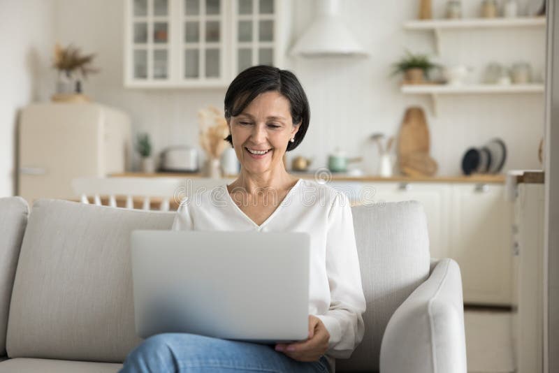 Mature Woman Spend Time at Home with Notebook Stock Image - Image of ...