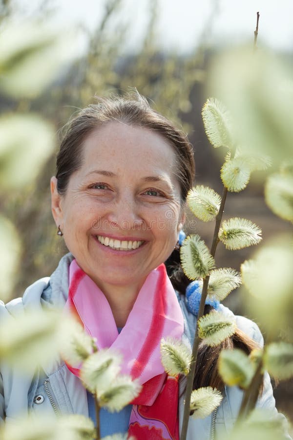 Mature woman in spring stock image. Image of elderly - 19337229