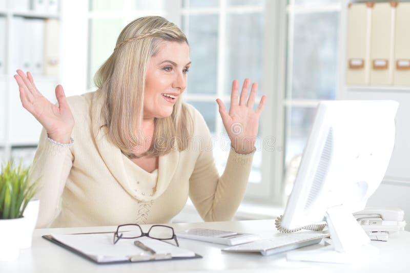 Two Excited Mature Women Working in Office Stock Image - Image of ...