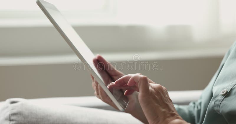 Mature Woman Using Online Application, Internet Technology on Tablet ...