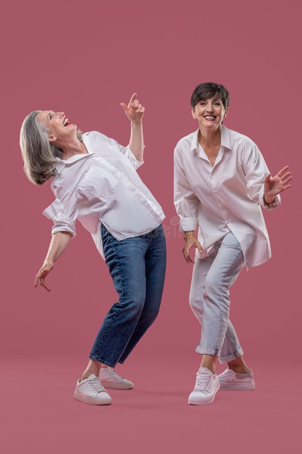 Mature Women Looking Entertained and Spending Good Time Together Stock ...