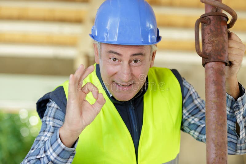 Mature Worker Showing Ok Sign Stock Photo - Image of carpenter, house ...