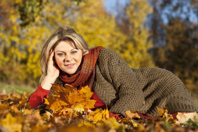 Matured Woman in Fall Surrondings Stock Photo - Image of woman, fall ...