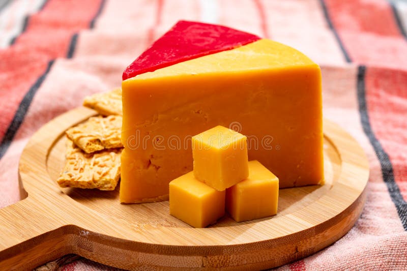 Matured Yellow and Red Waxed Cheddar Cheese Close Up Stock Image ...