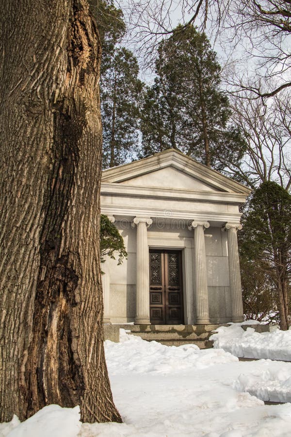 Mausoleum in a Graveyard in Winter Next To a Tree Stock Photo - Image ...