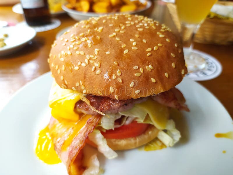 Maxi Burger with Cheese and Egg Stock Photo - Image of hamburger, food ...