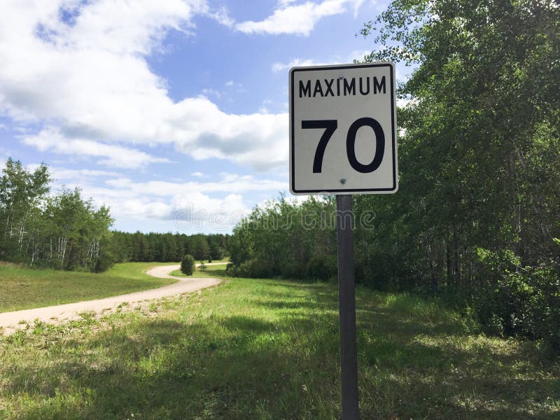 A Maximum 20 Km Per Hour Sign Along a Gravel Road Stock Photo - Image ...