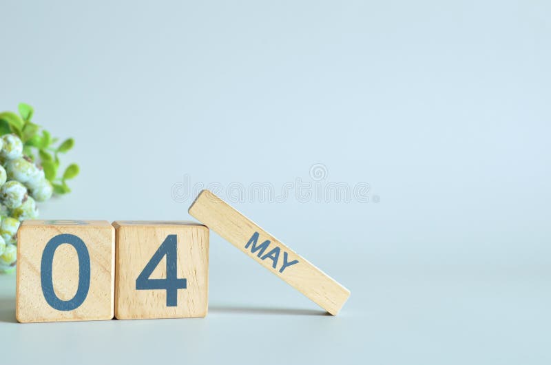 May 04, Calendar Cover Design with Number Cube with Green Fruit on Blue ...